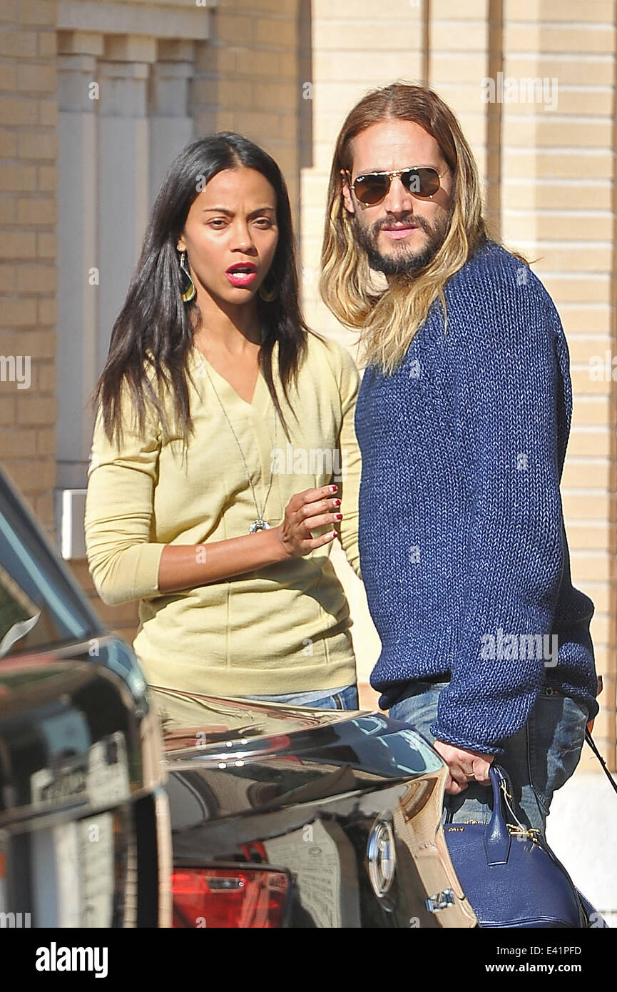 Zoe saldana leaves barneys with her husband hi-res stock photography ...