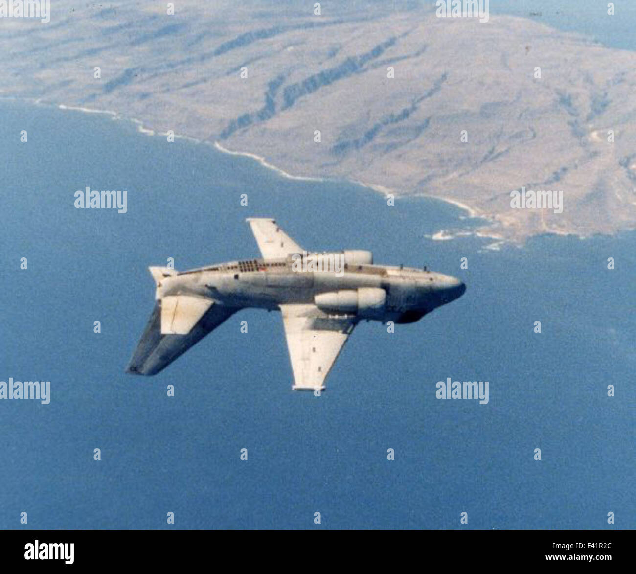 A photograph of an S-3B Viking aircraft performing a loop ...