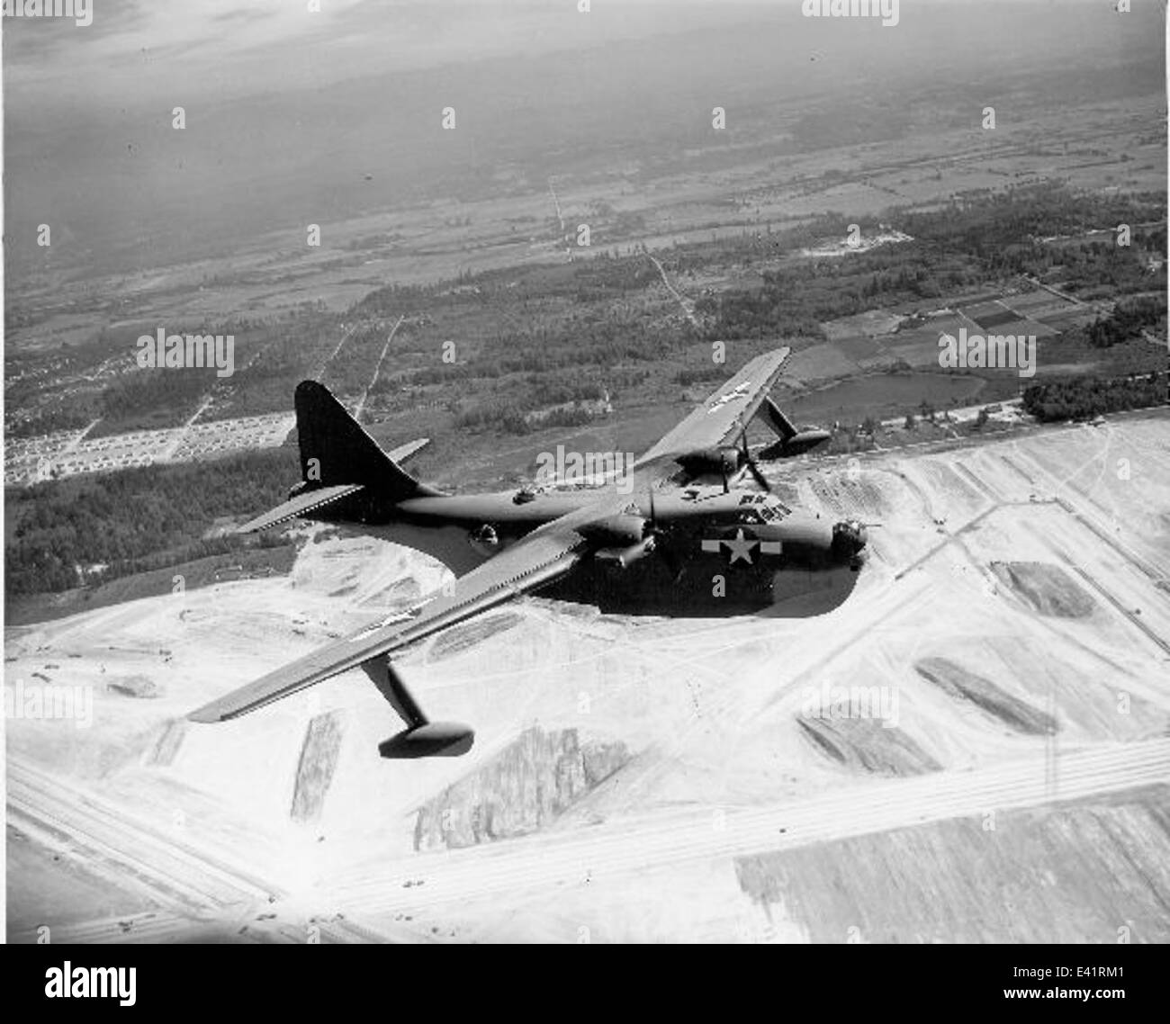 The PBB-1 aircraft in flight, demonstrating its unique design as a ...