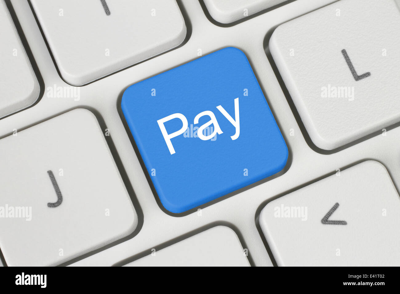 Blue pay keyboard button Stock Photo - Alamy