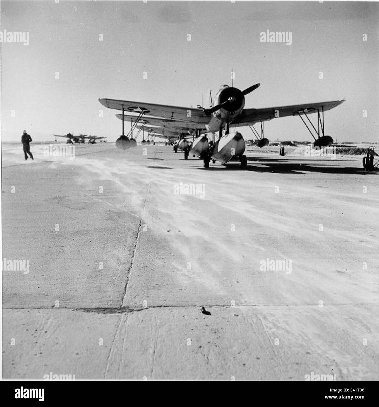 A 1942 photograph showing a line of OS2U aircraft at Corpus Christi ...
