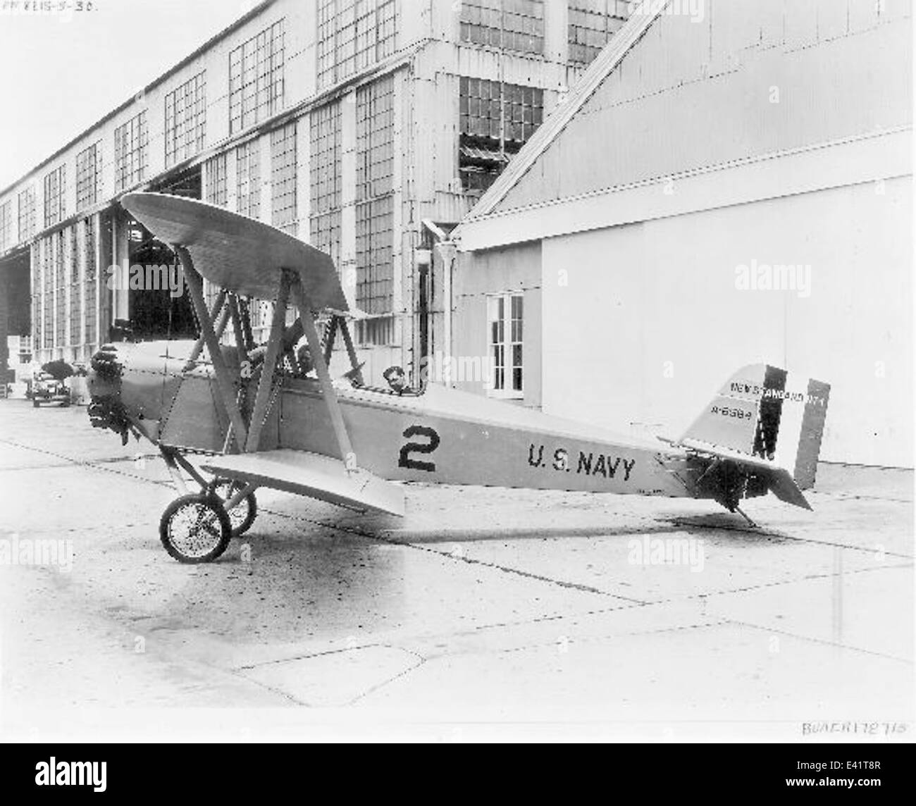 A photograph of the New Standard NT-11, a 1930s biplane used for both ...