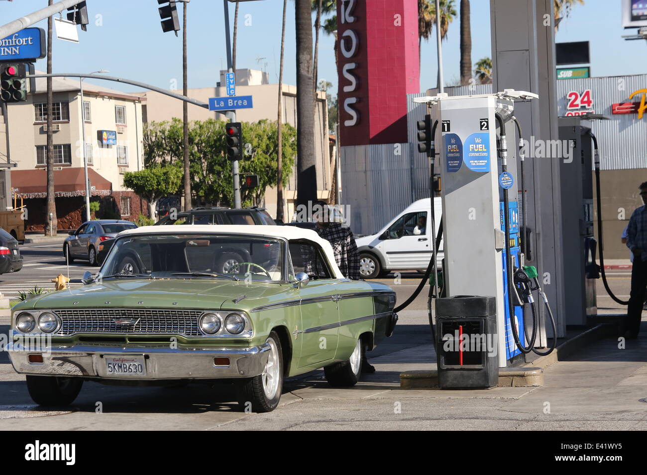 Benji Madden pumping gas in West Hollywood in his mint green classic ...