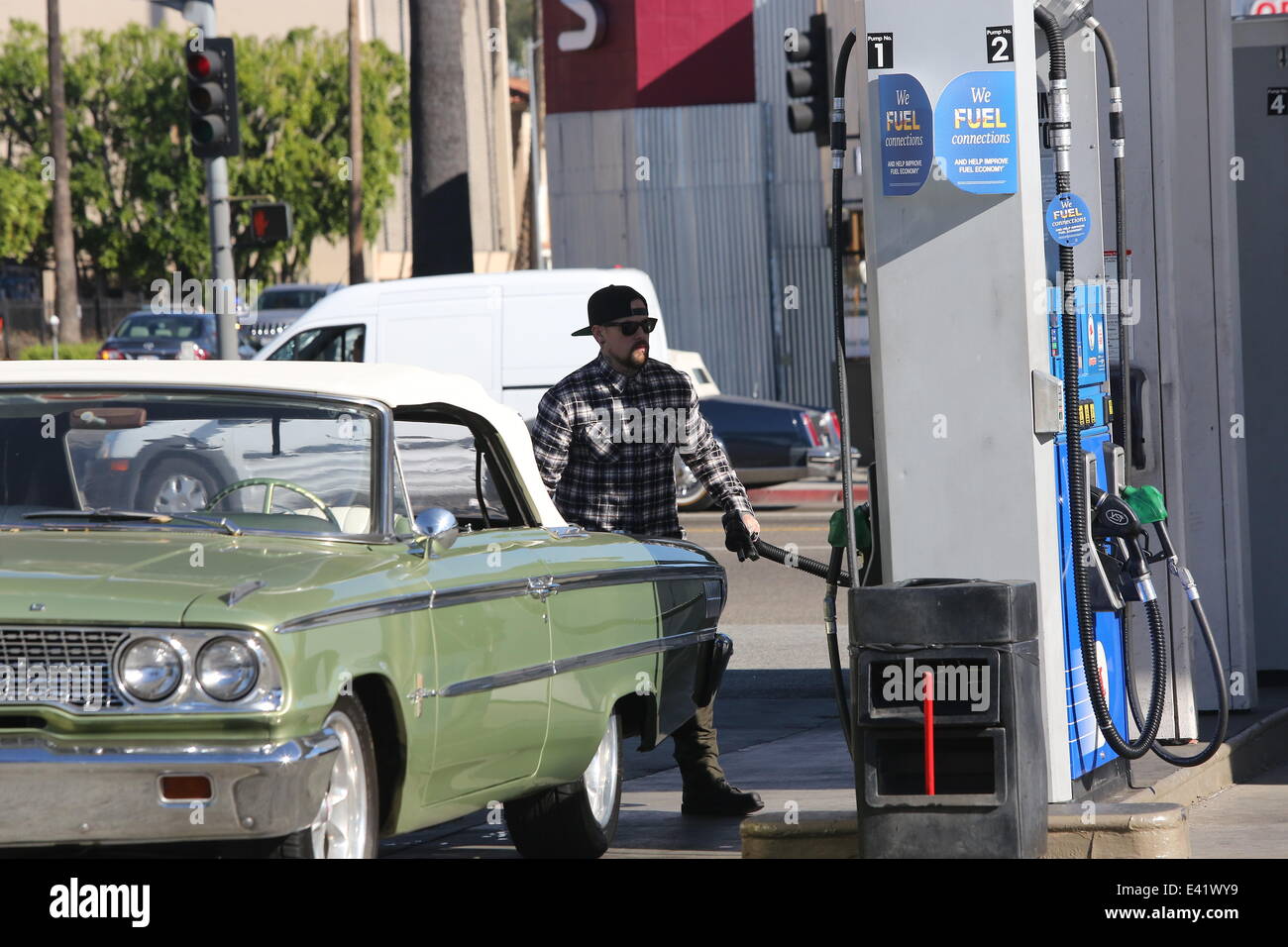 Benji Madden pumping gas in West Hollywood in his mint green classic ...