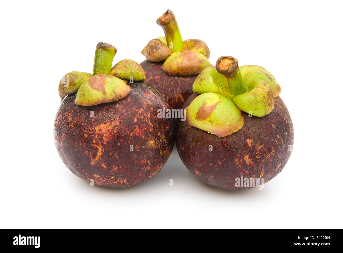three mangosteens with clipping path Stock Photo - Alamy