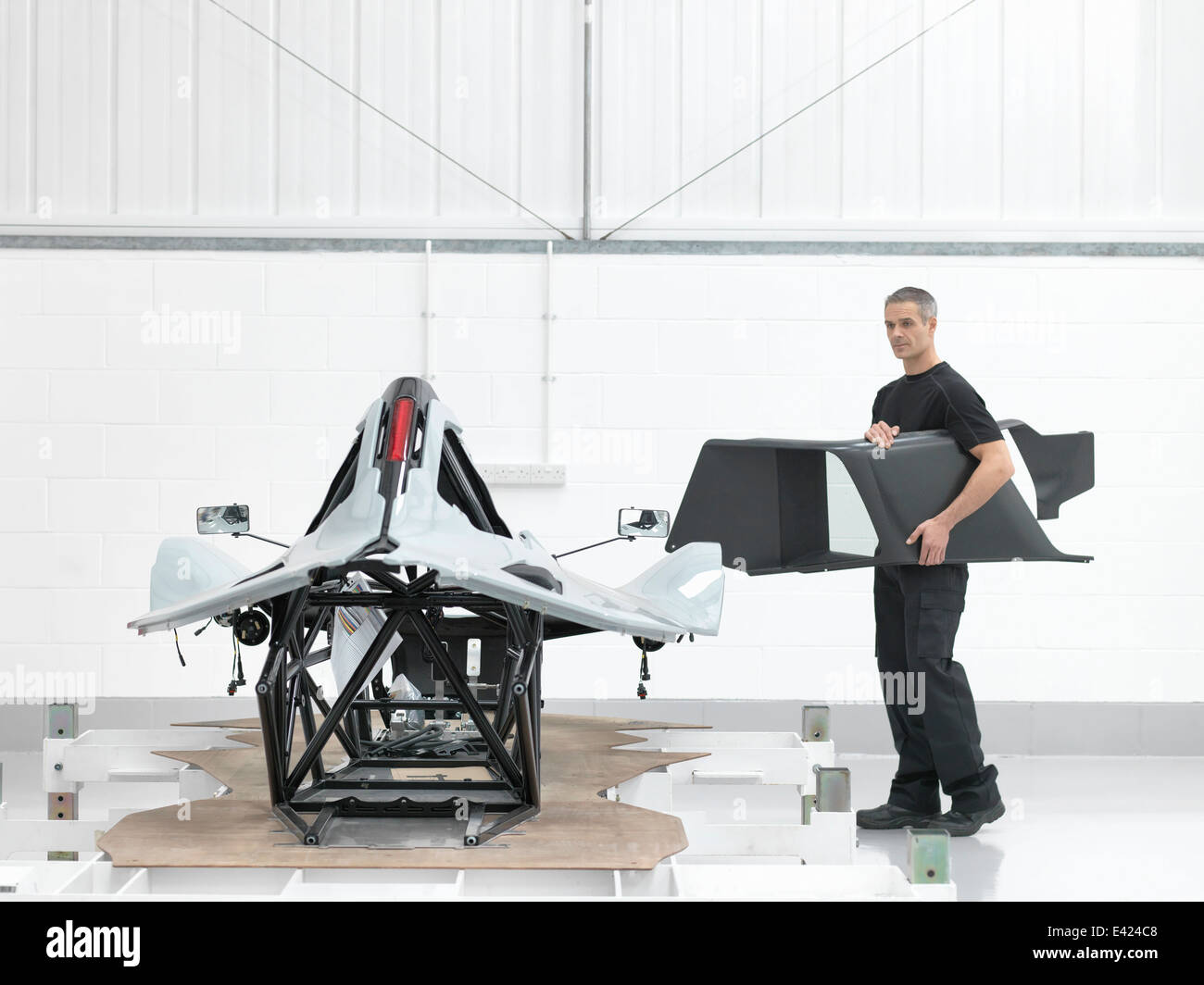 Car engineer with part hi-res stock photography and images - Alamy