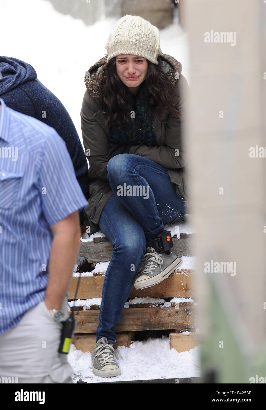 Actress Emmy Rossum crying on the set of "Shameless" as she walks down ...