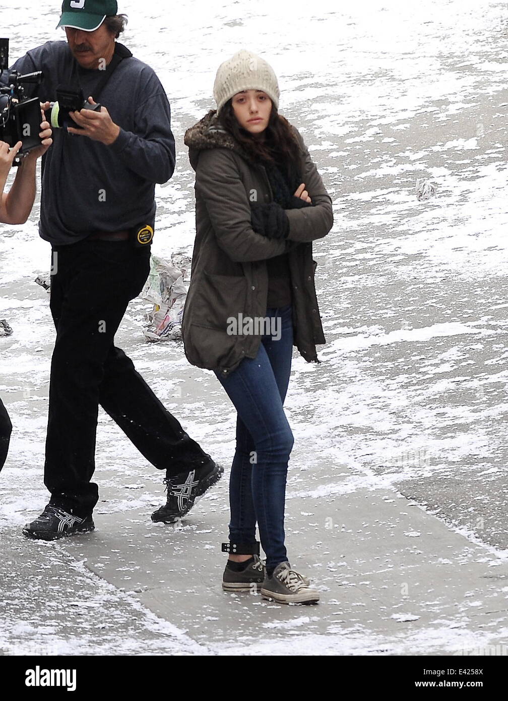 Actress Emmy Rossum crying on the set of "Shameless" as she walks down ...