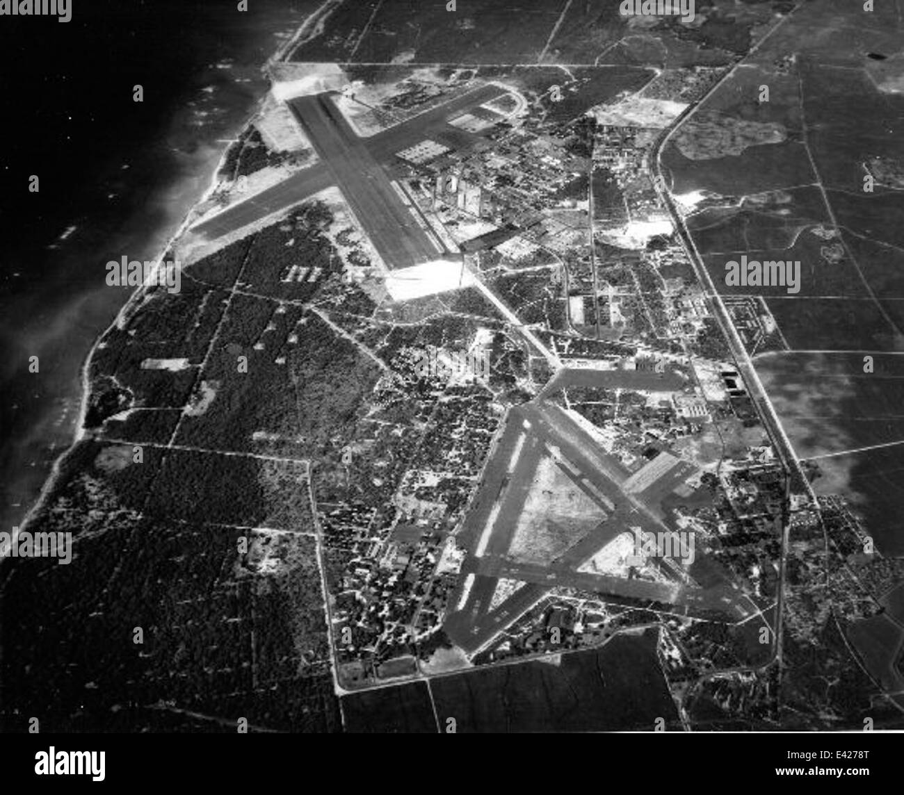 This photograph captures Naval Air Stations Barbers Point and Ewa, both ...
