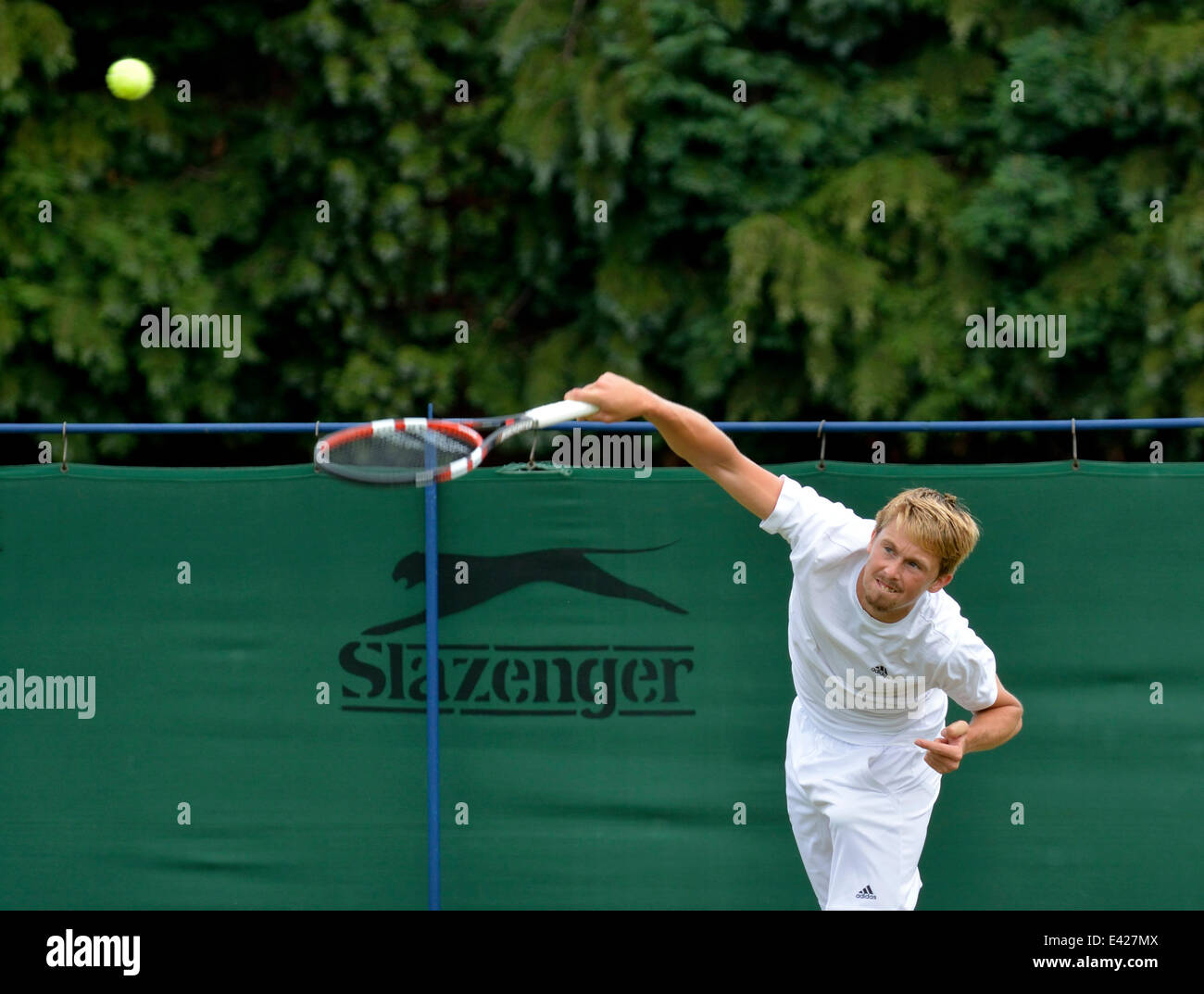 Manchester, UK 2nd July 2014 Joshua Milton serves during his 7-6, 6-3 ...