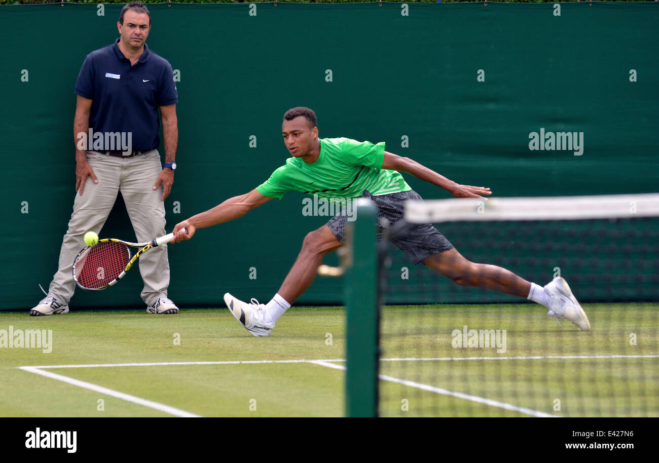 Manchester, UK 2nd July 2014 Marshall Tutu plays a forehand return during his 4-6, 4-6 defeat ...