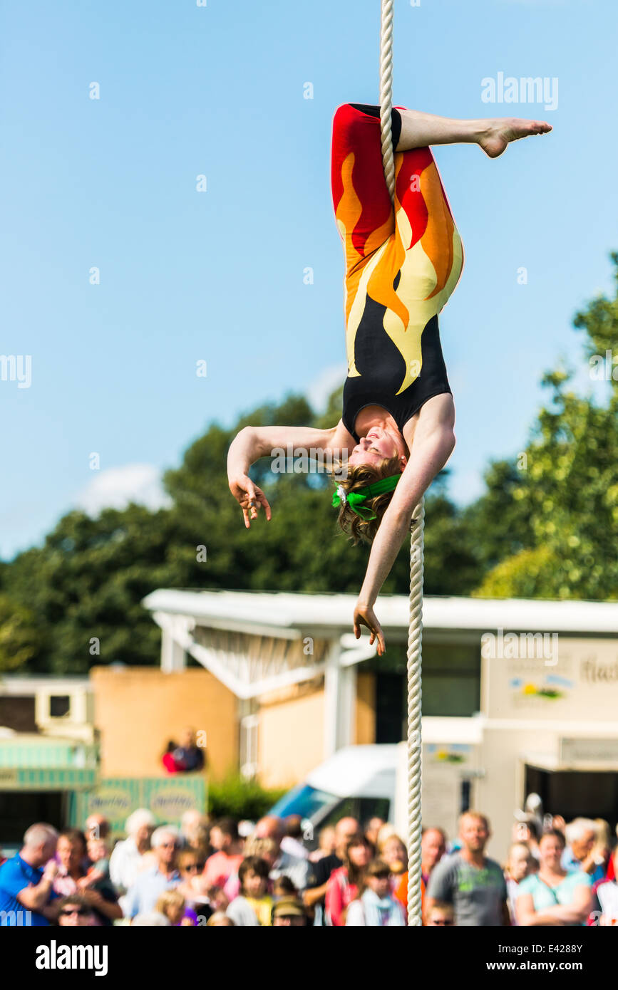 Rope acrobat performing Stock Photo - Alamy