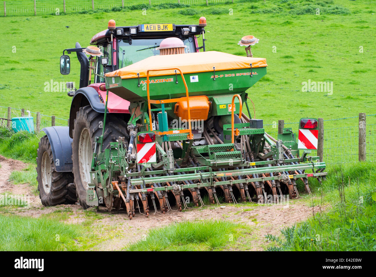 Tractor sowing seeds seed drill hi-res stock photography and images - Alamy