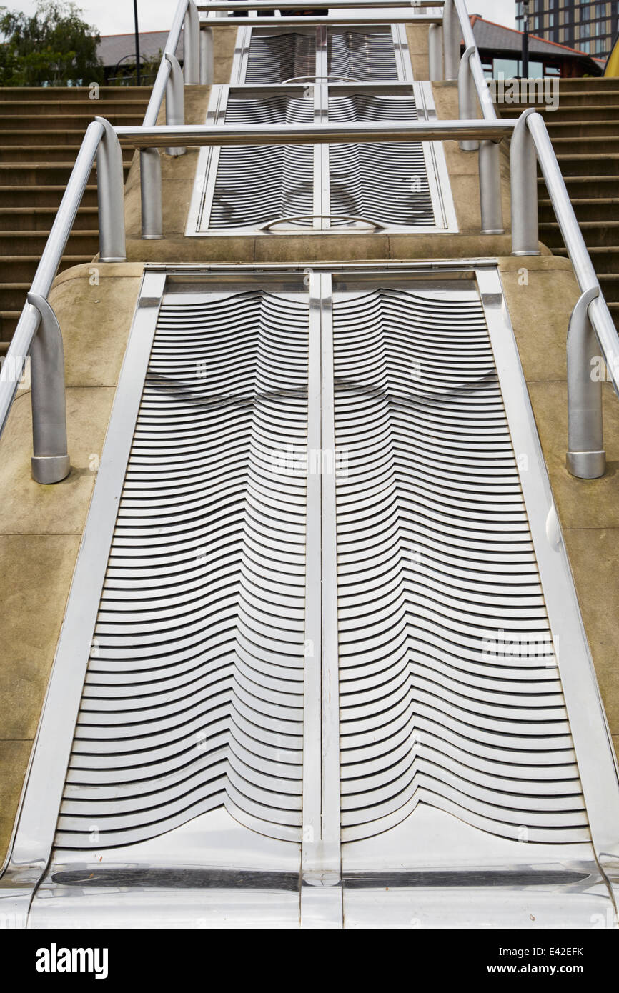 Decorative stainless steel louvres between the steps of Sheffield train ...
