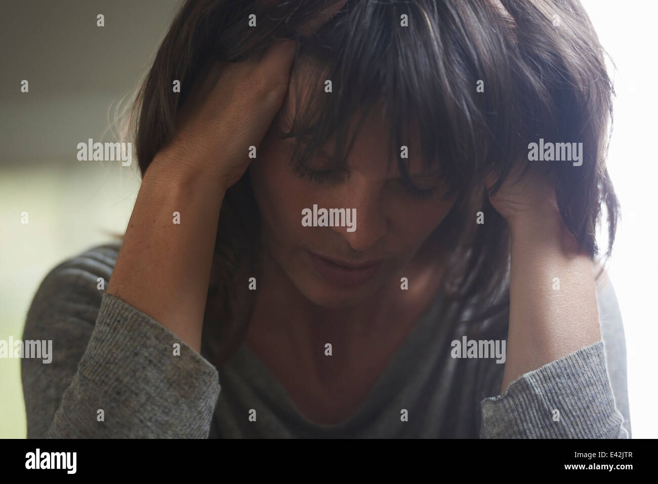 Head in hands hi-res stock photography and images - Alamy