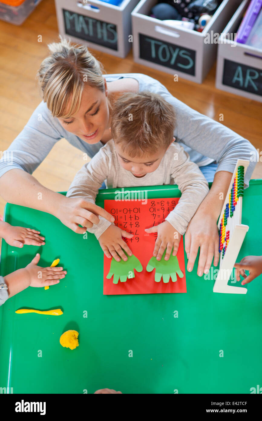 Child counting fingers hi-res stock photography and images - Alamy