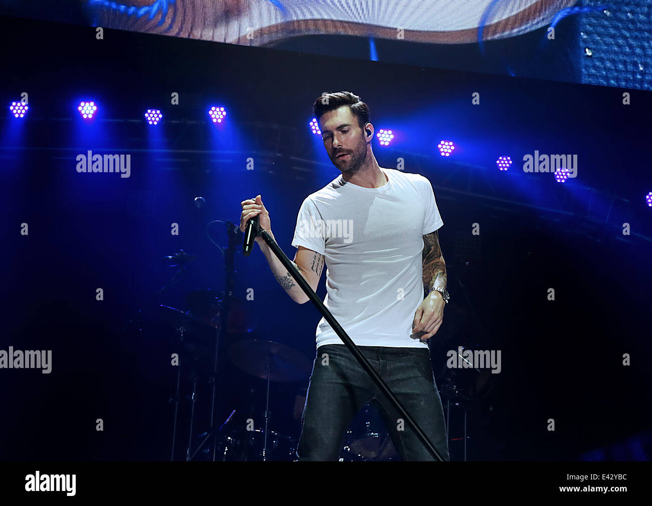 Maroon 5 performing live on stage at Manchester Phones4U Arena ...