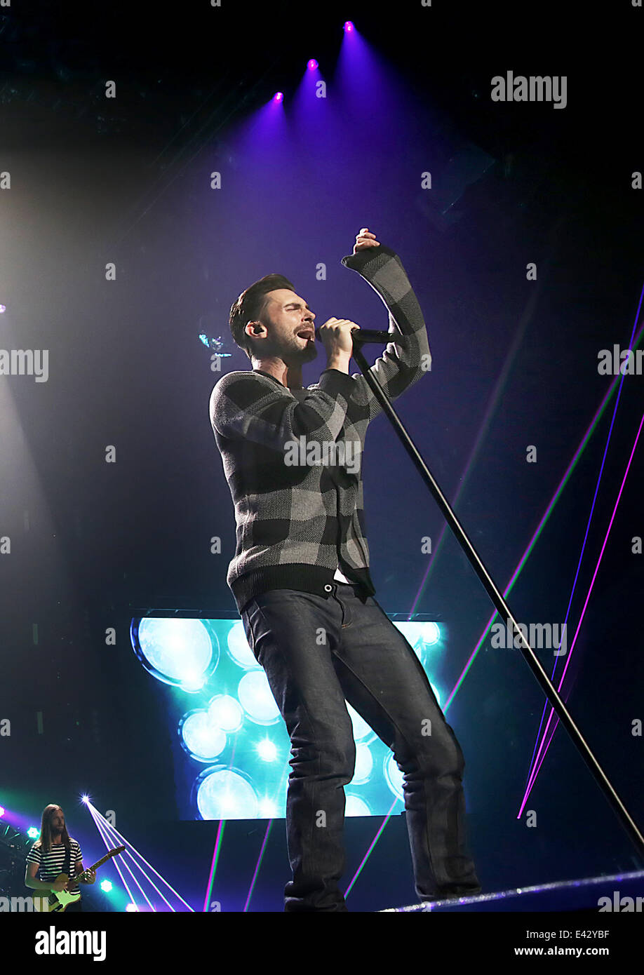 Maroon 5 performing live on stage at Manchester Phones4U Arena ...