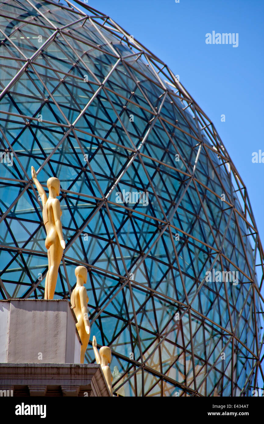 Rooftop sphere detail with the golden sculpture of the standing men ...