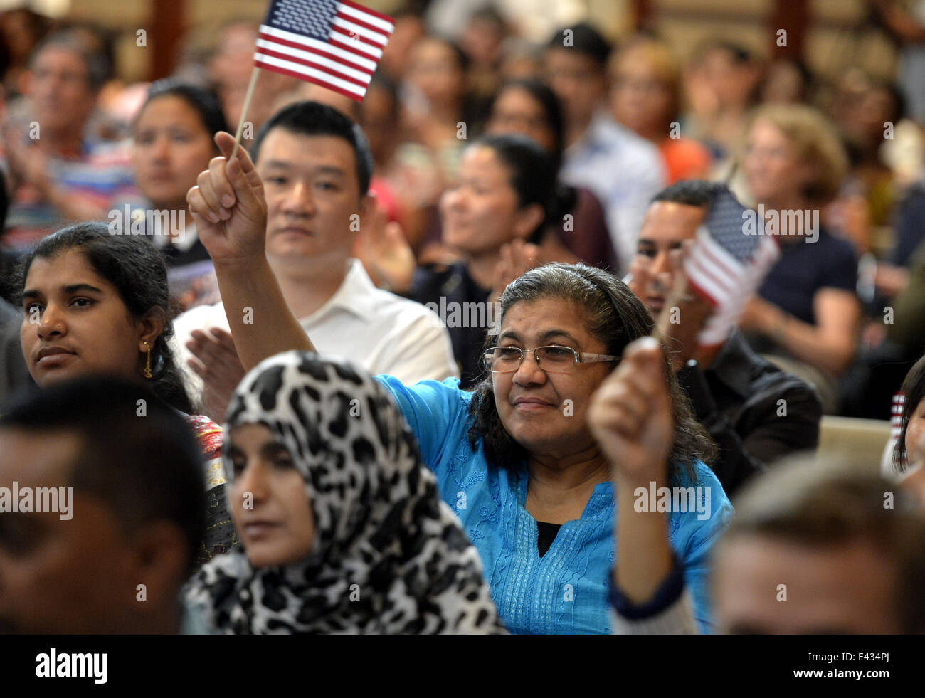 New York, USA. 2nd July, 2014. New U.S. citizens take part in an United ...