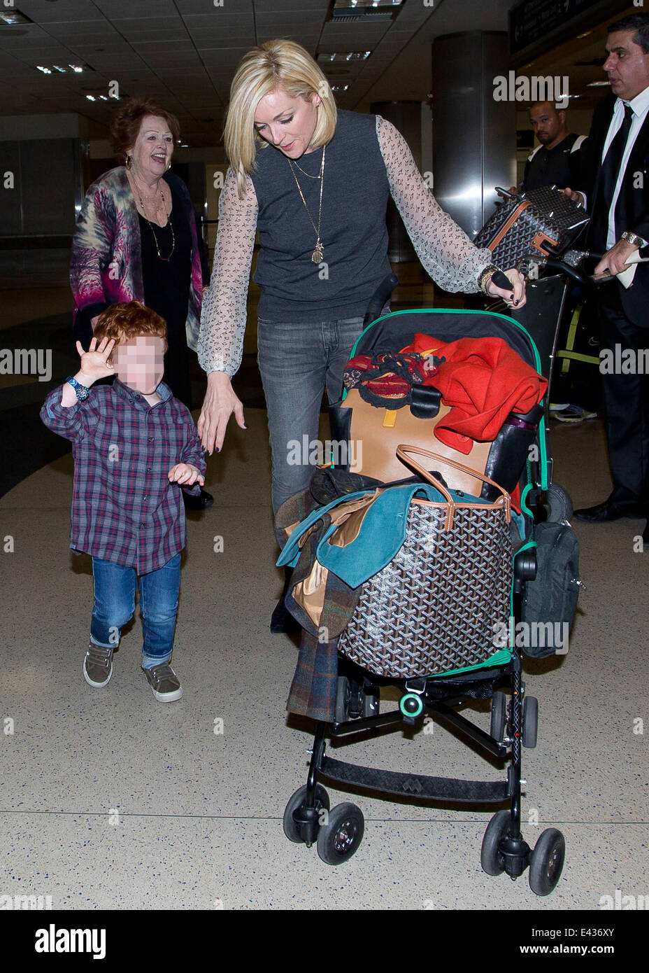 Jane Krakowski and her son, Bennett at Los Angeles International ...