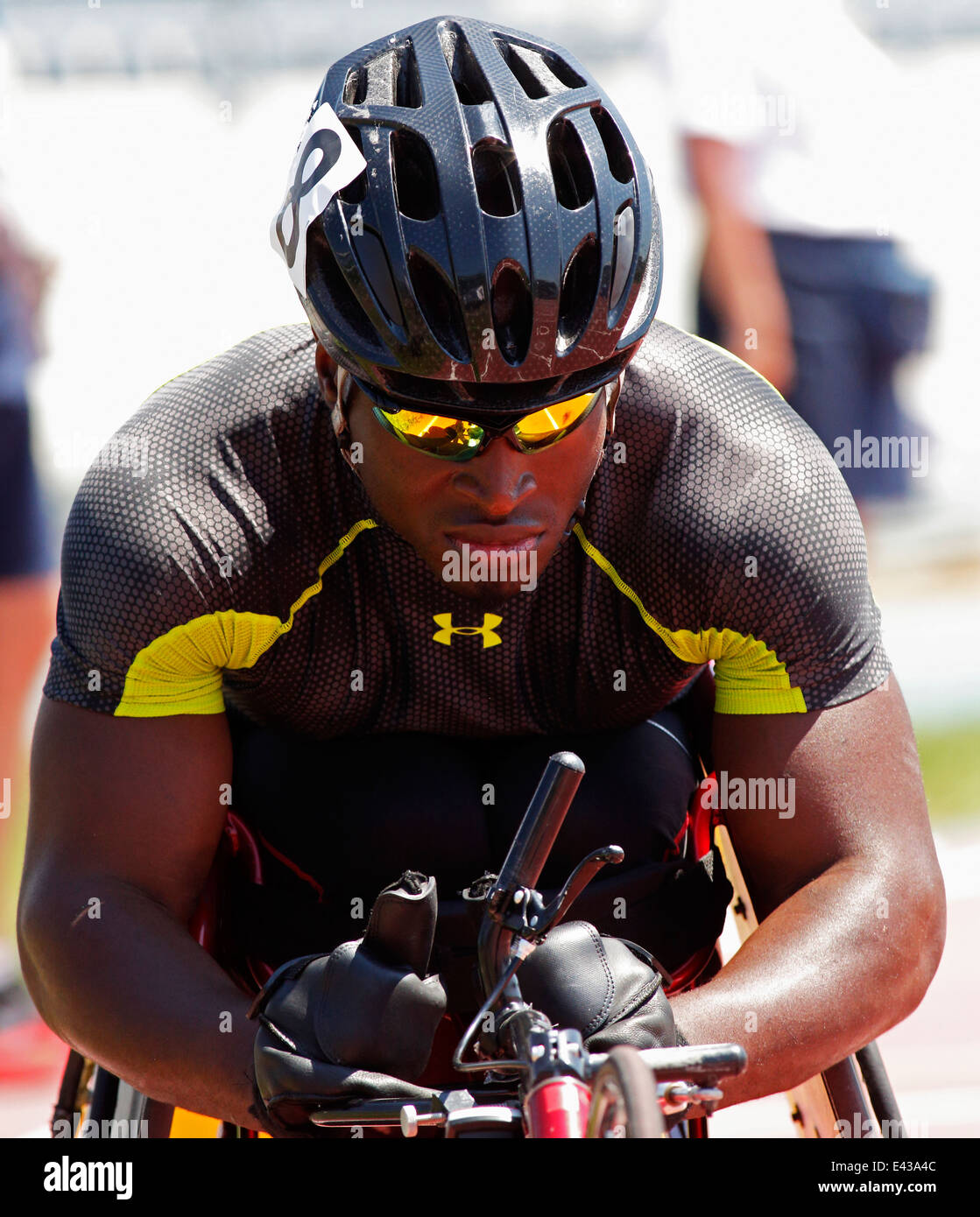 Isaiah Christophe competes in the men's 200-meter wheelchair race at ...