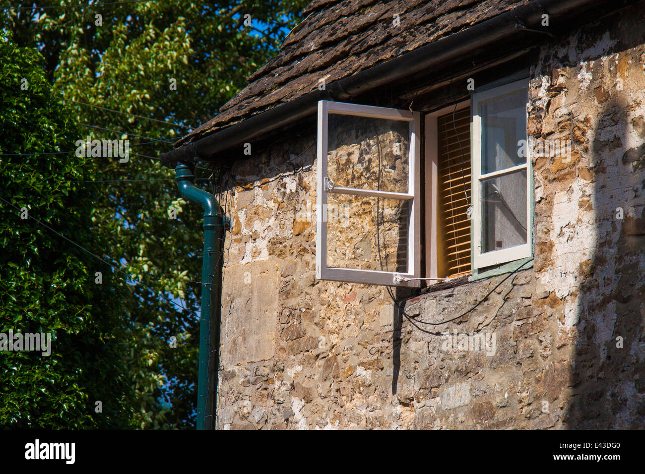 An open window on an English country cottage Stock Photo - Alamy