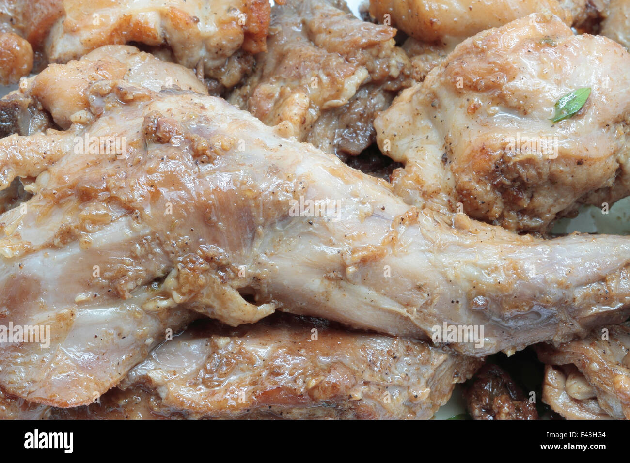 picture of a tasty dish of rabbit with garlic Stock Photo - Alamy