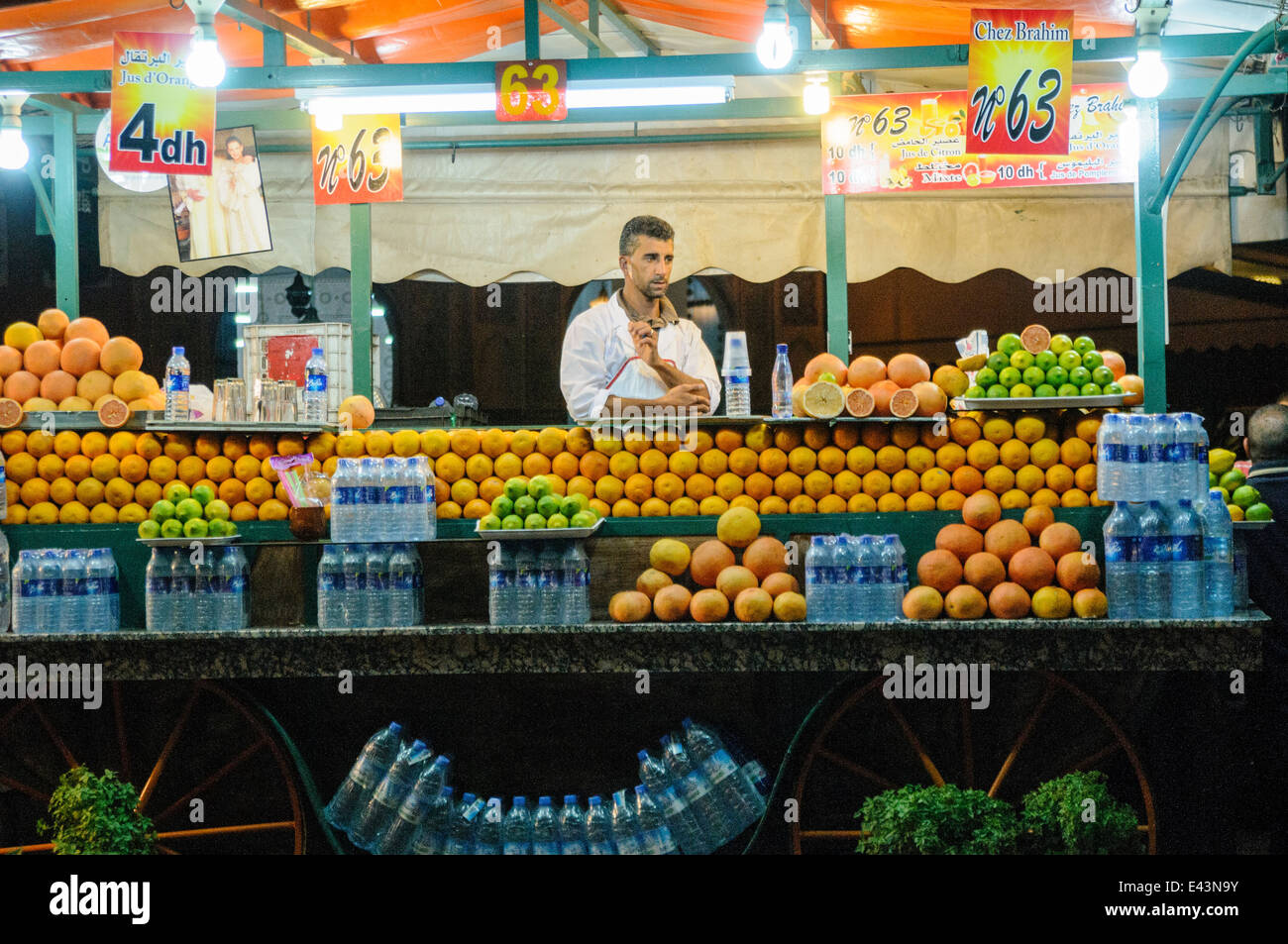 Orange juice seller at the Jemaa El-Fna Fnaa (Big Square) at night ...