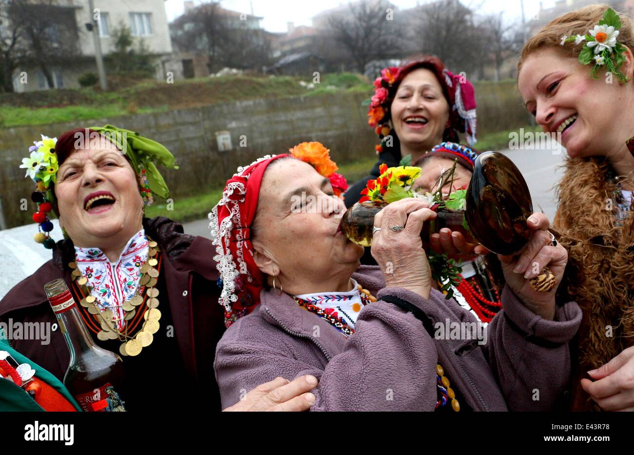 Bulgarian women dressed up for a carnival perform in celebration of the ...
