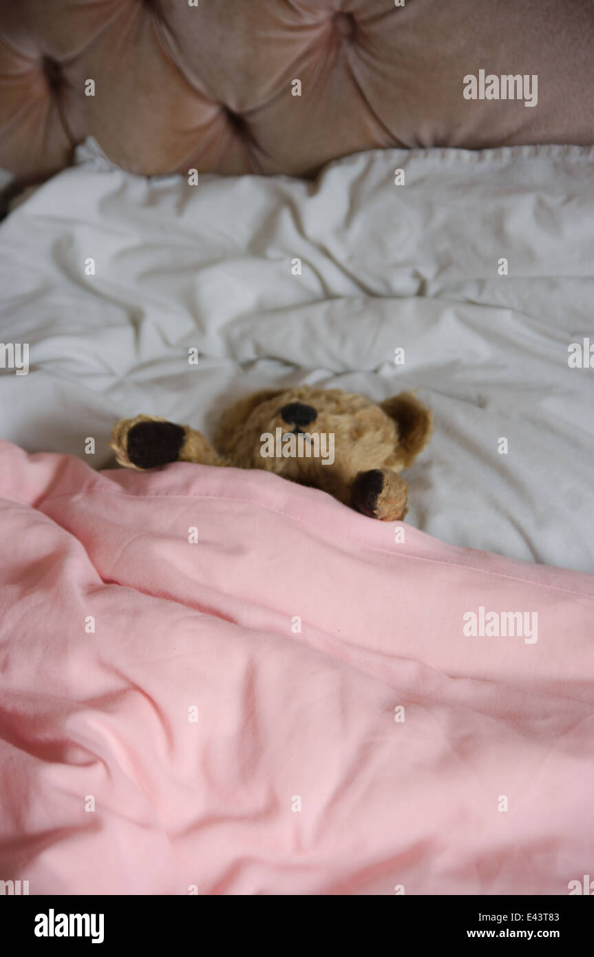 Tucked up in bed hi-res stock photography and images - Alamy