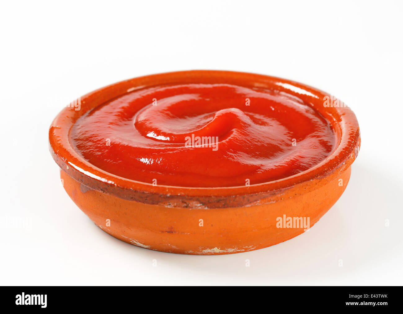 Bowl of smooth tomato puree Stock Photo - Alamy