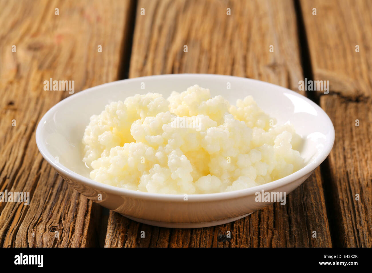 Organic probiotic milk kefir grains Stock Photo - Alamy