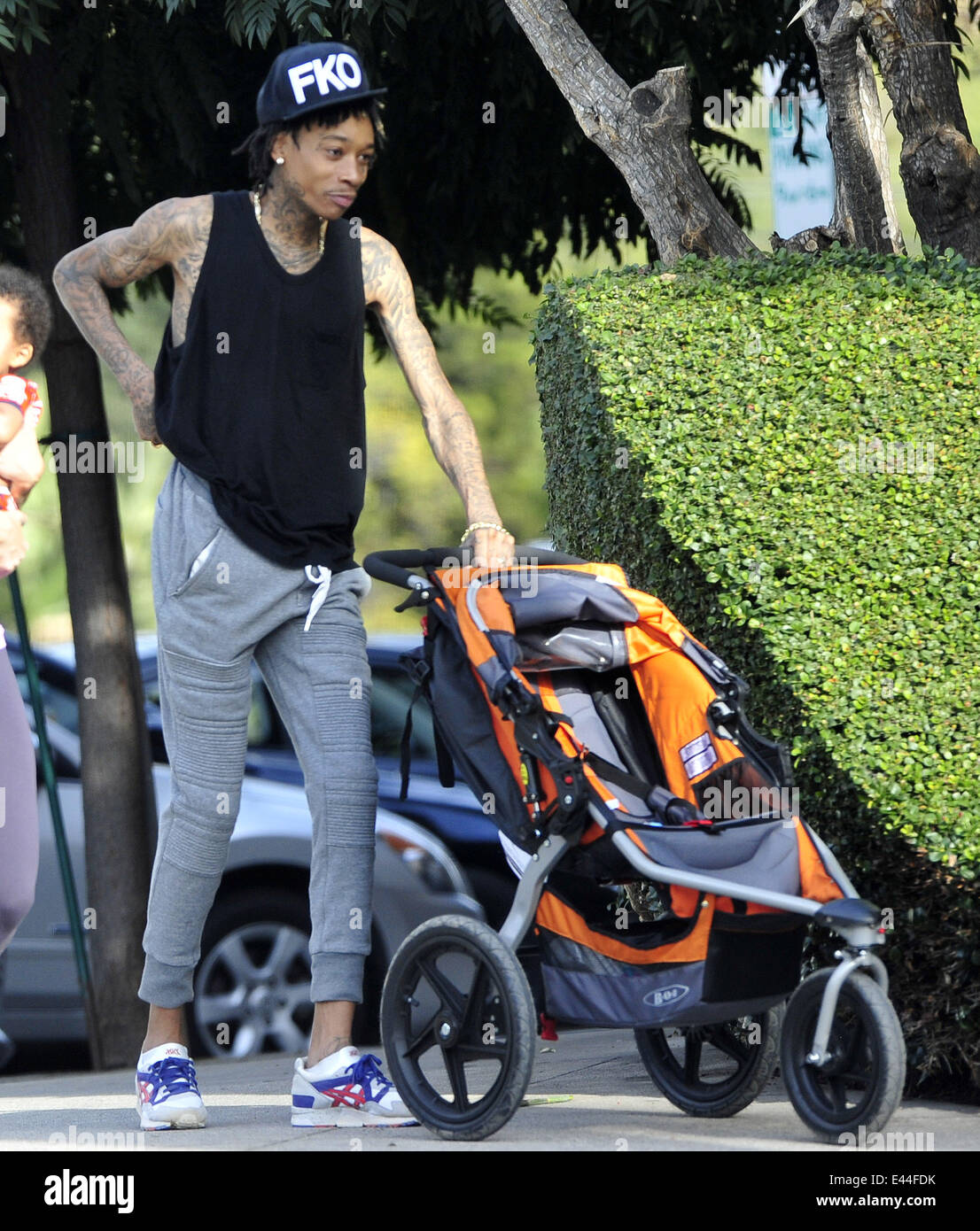 American rapper Wiz Khalifa takes his wife and son Sebastian on a hike ...