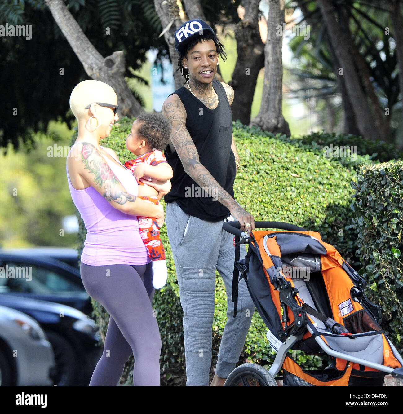 American rapper Wiz Khalifa takes his wife and son Sebastian on a hike ...
