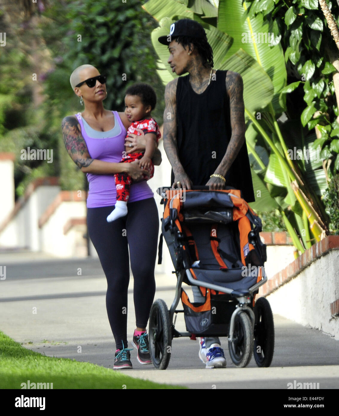 American rapper Wiz Khalifa takes his wife and son Sebastian on a hike ...