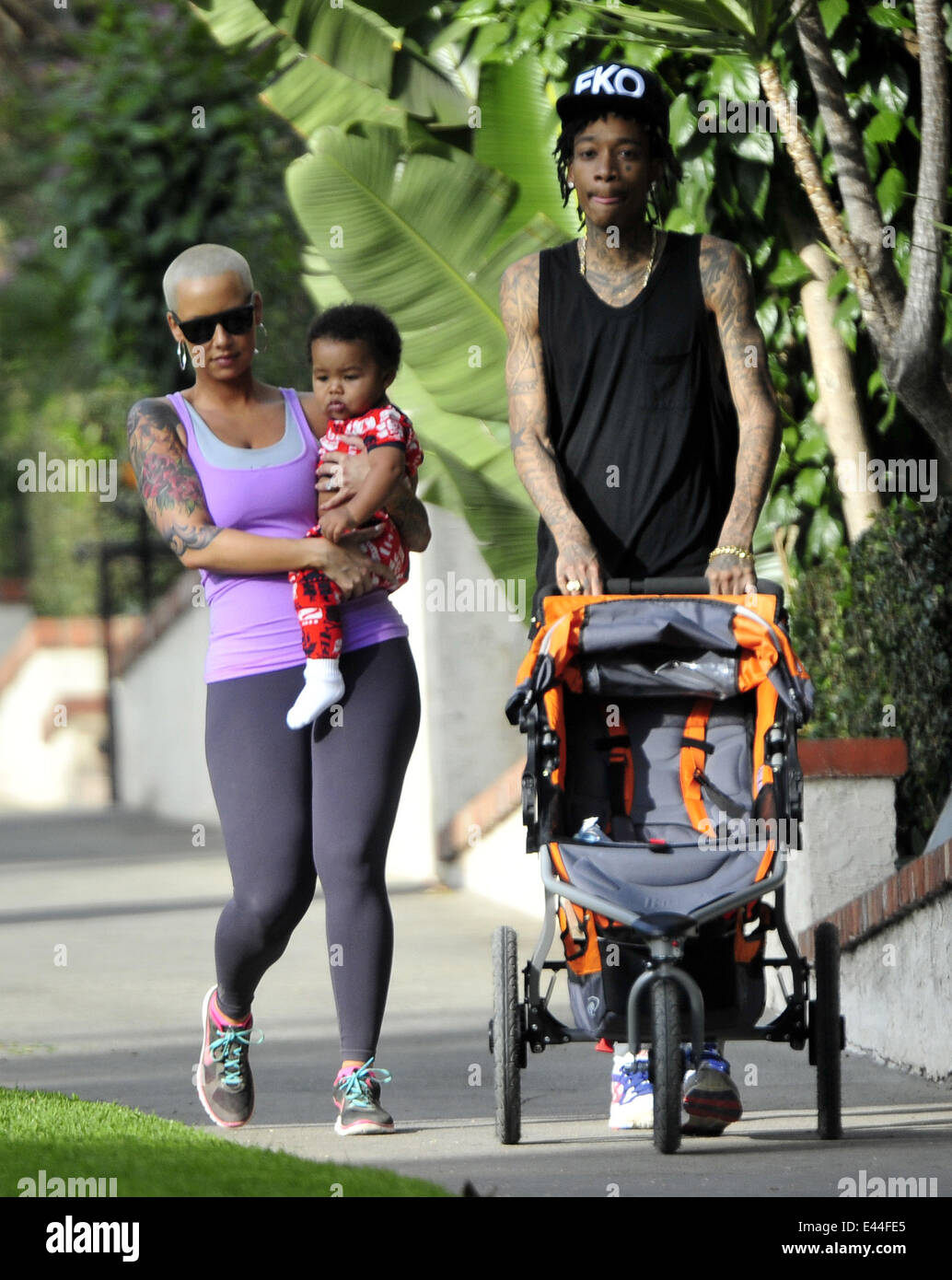 American rapper Wiz Khalifa takes his wife and son Sebastian on a hike ...