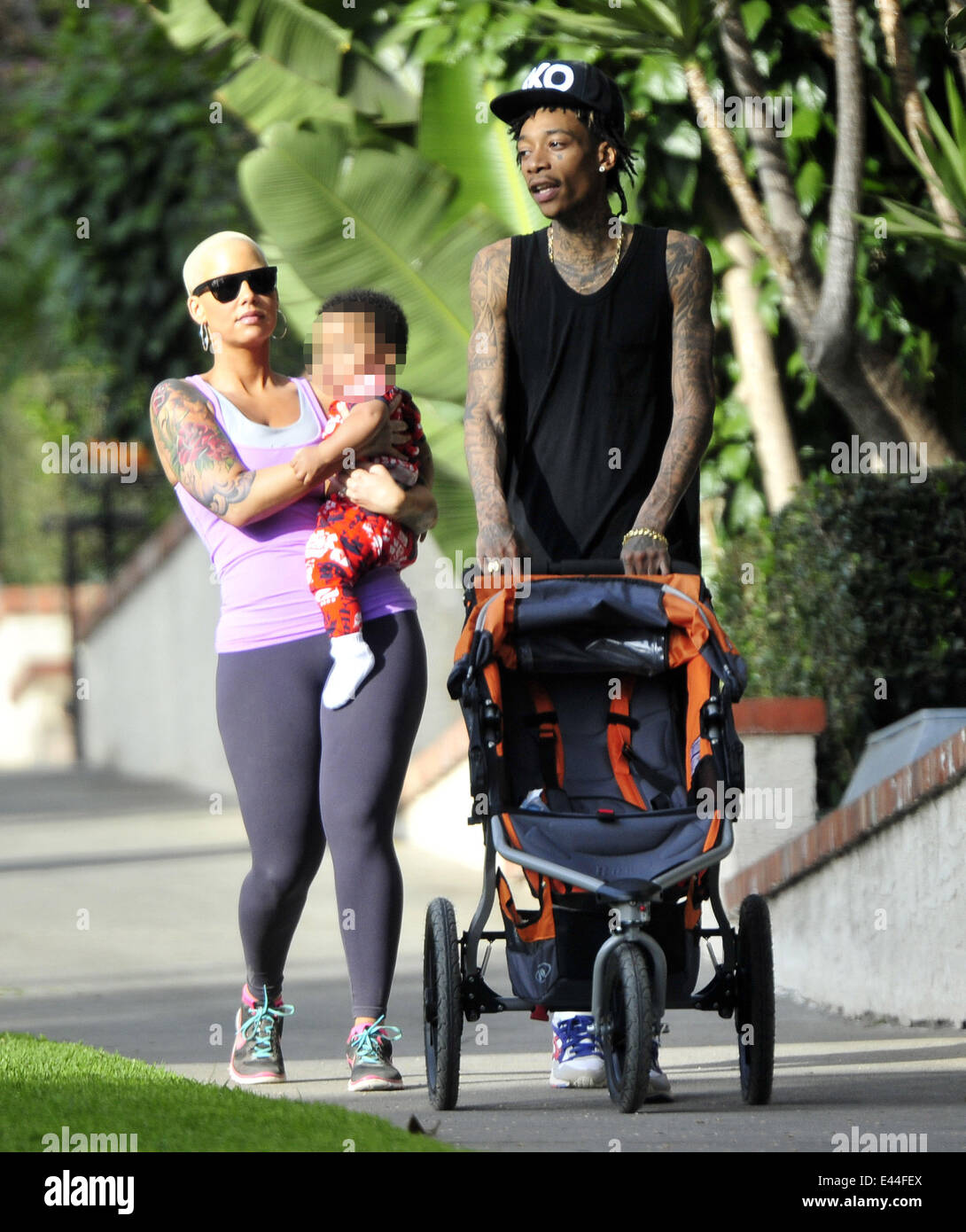 American rapper Wiz Khalifa takes his wife and son Sebastian on a hike ...