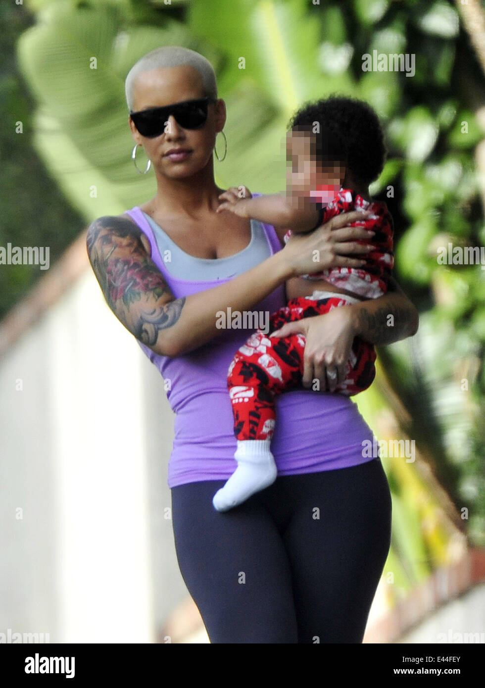 American rapper Wiz Khalifa takes his wife and son Sebastian on a hike ...