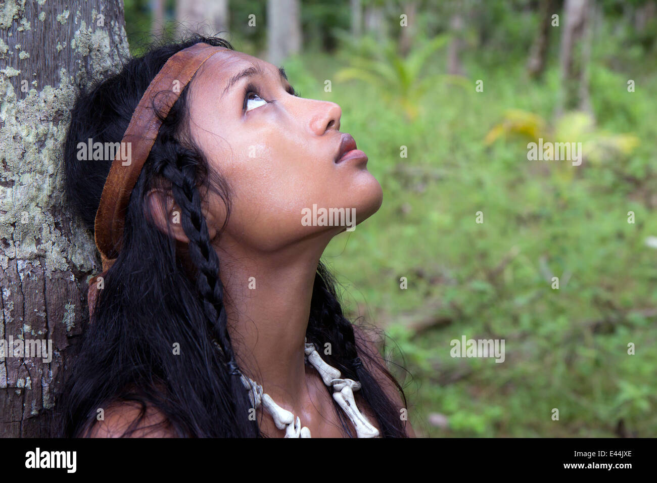 Portrait indian woman against tree hi-res stock photography and images ...