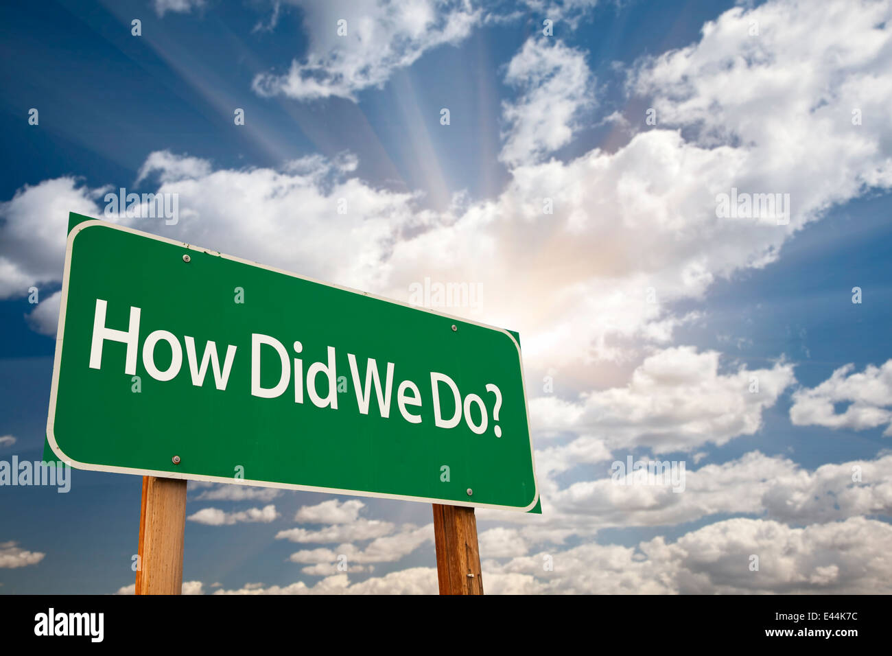 How Did We Do Green Road Sign with Dramatic Clouds and Sky Stock Photo ...