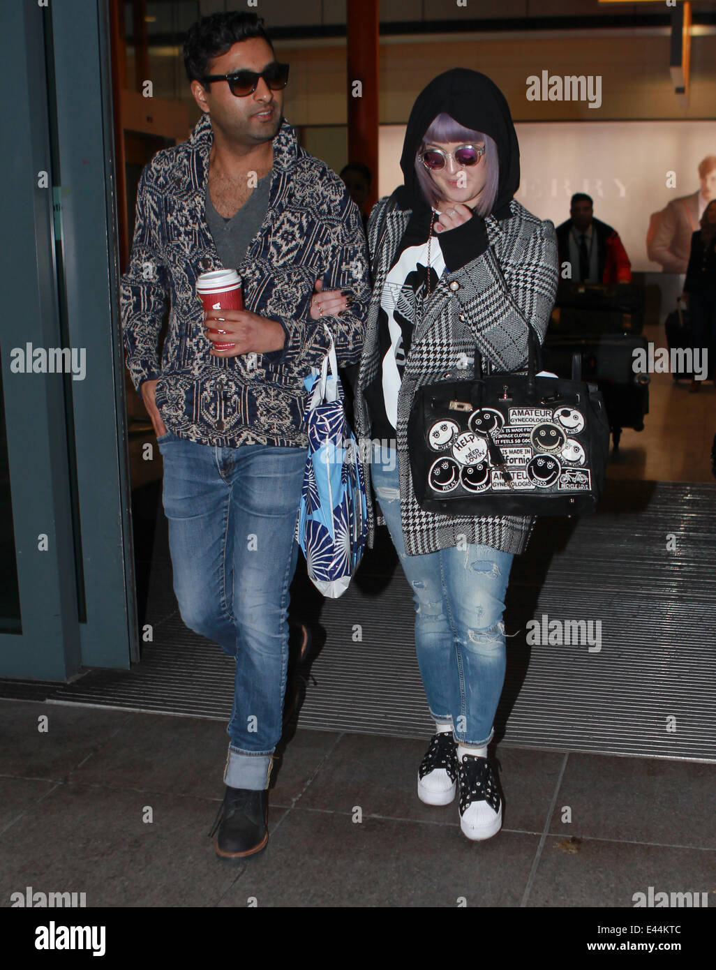 Kelly Osbourne arrives at London Heathrow with a friend after a flight ...
