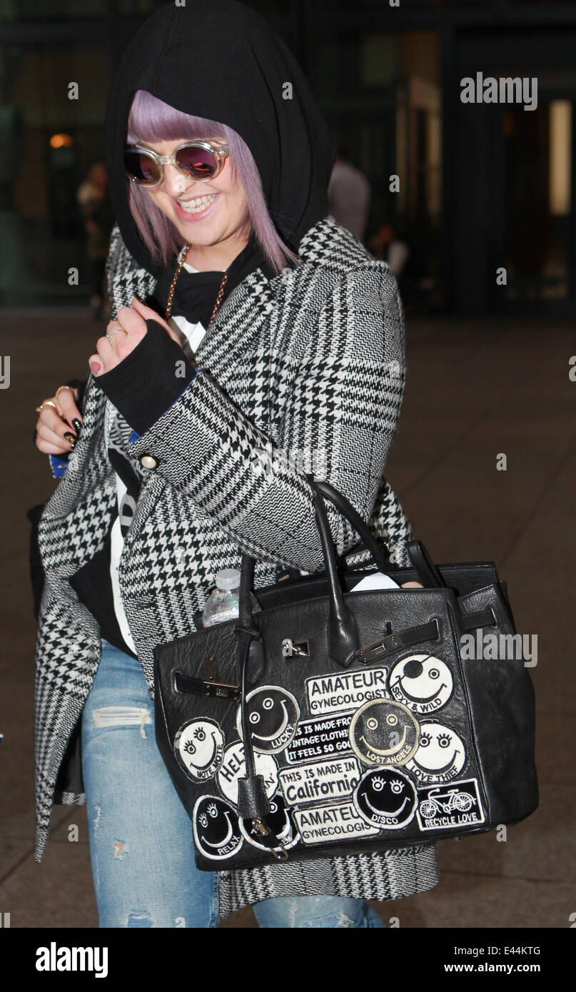 Kelly Osbourne arrives at London Heathrow with a friend after a flight ...