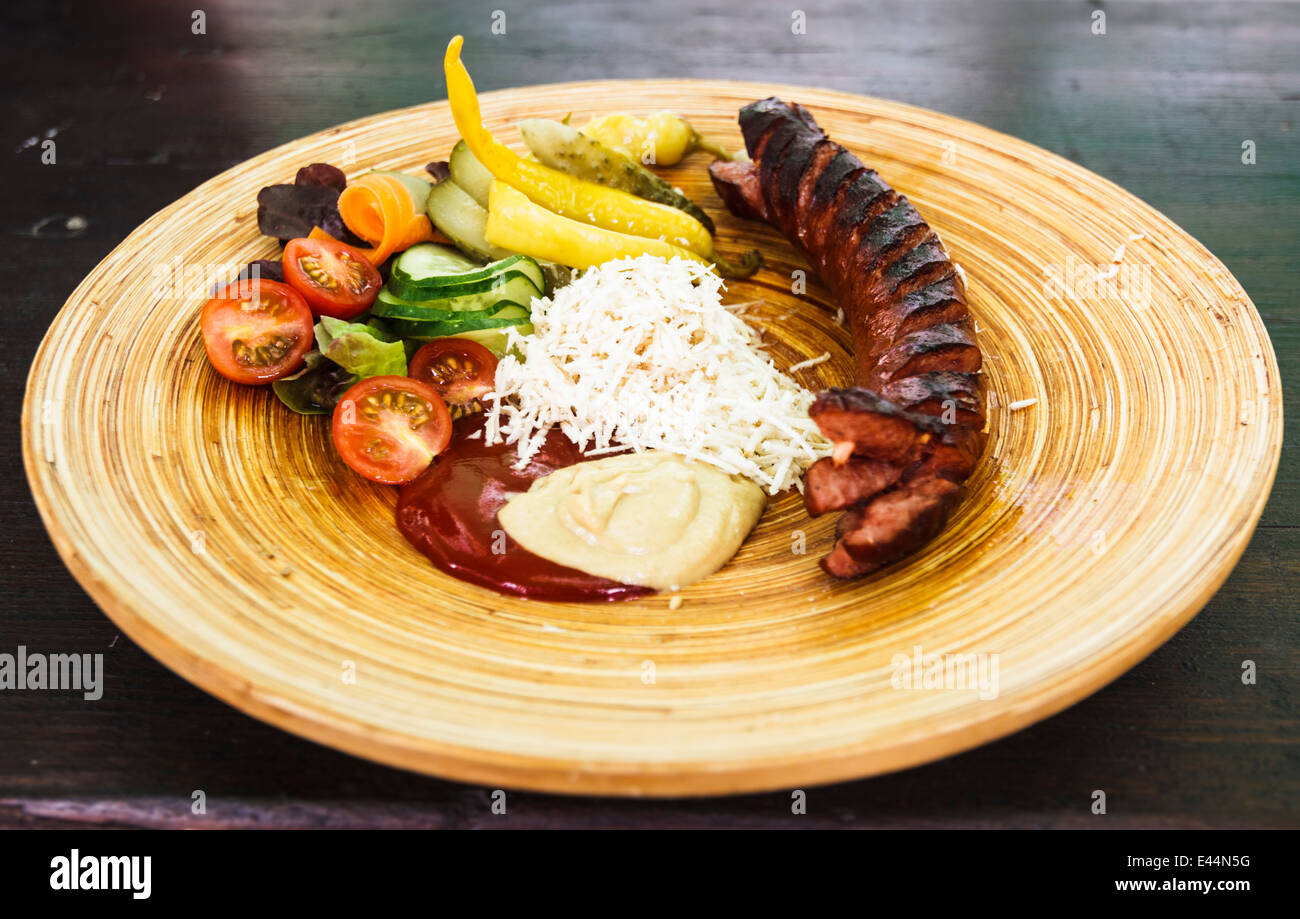 Klobasa - Kielbasa sausage with salad Stock Photo - Alamy