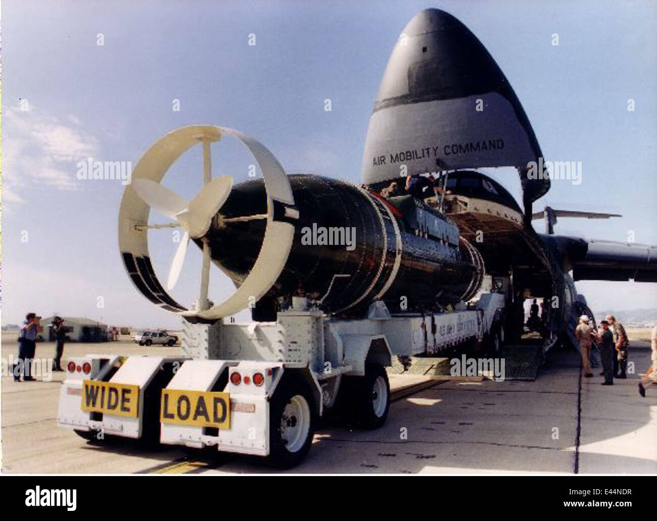 A photograph showing the Mystic DSRV-1, a deep submergence rescue vehicle, loaded onto a C-5 ...