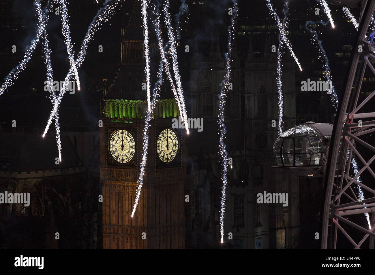 Fireworks displays over the London Eye mark the arrival of the New Year ...