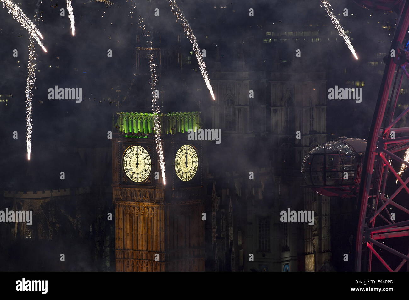 Fireworks displays over the London Eye mark the arrival of the New Year ...