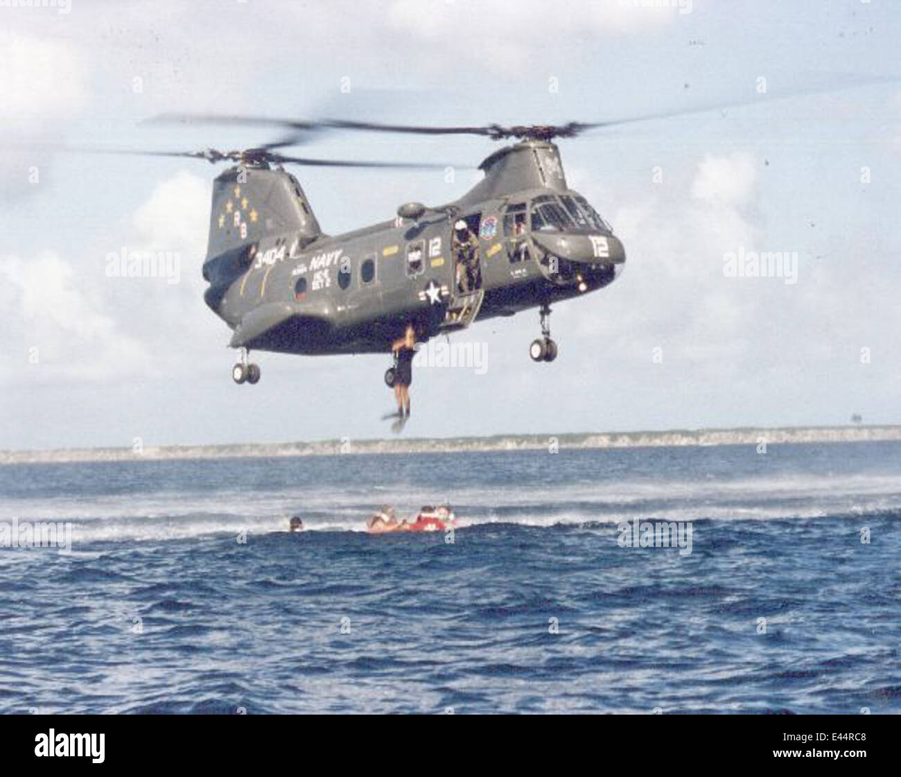 A photograph showing the HC-5 Det 2 UH-46D helicopter in a rescue ...