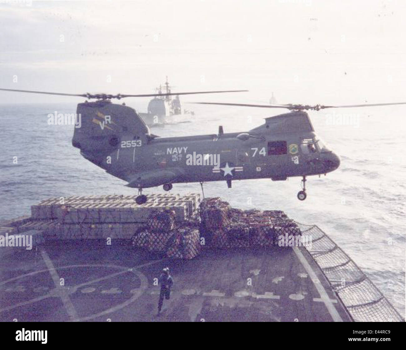 A photograph of a CH-46A Sea Knight helicopter performing vertical ...