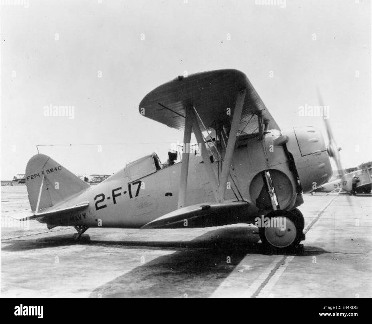 This image shows a Grumman F2F-1 fighter aircraft warming up ...